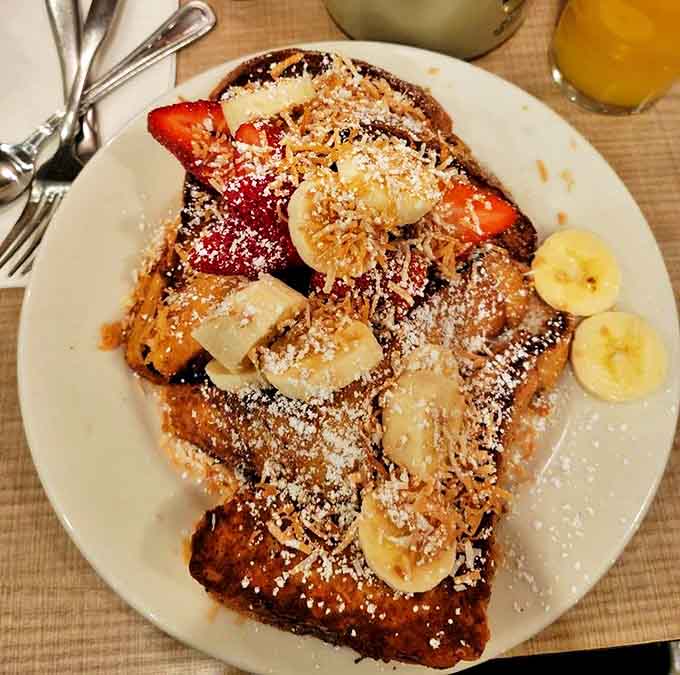 French toast reaches new heights here, thick and custardy with fresh fruit, proving simple done right beats fancy every time.