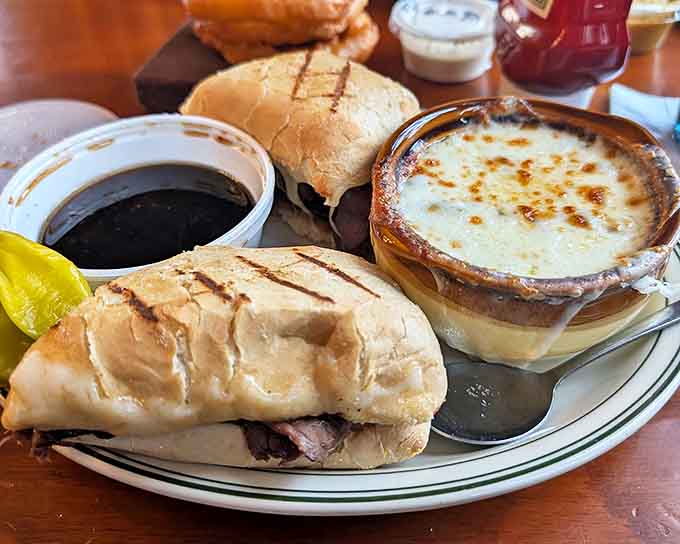 Tender beef nestled in a crusty roll with soul-warming au jus for dipping creates a sandwich experience that's both elegant and deliciously messy.
