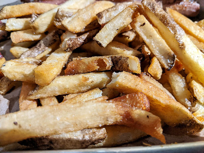 Hand-cut fries that remind you potatoes had a higher calling than just being side characters – these are supporting actors stealing scenes left and right.