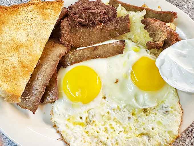 The Greek-inspired breakfast brings Mediterranean flavors to classic diner comfort, because why choose between cultures when you can have both?