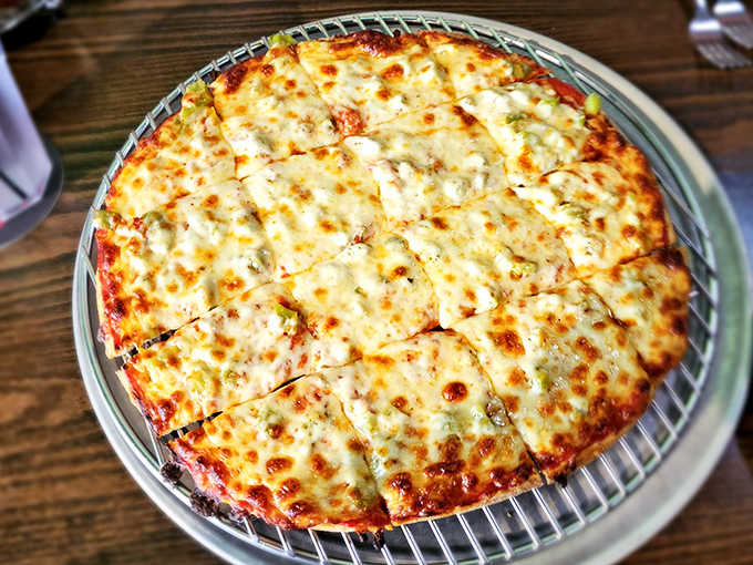 Simple perfection: melted cheese and green peppers on a perfectly baked crust demonstrate why classics never go out of style.