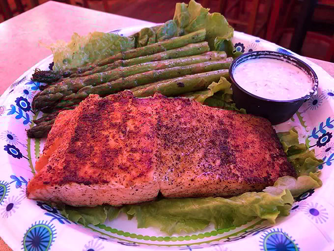 The salmon plate proves The Turf Club isn't just about indulgence &ndash; perfectly seasoned fish with fresh asparagus balances the menu beautifully.