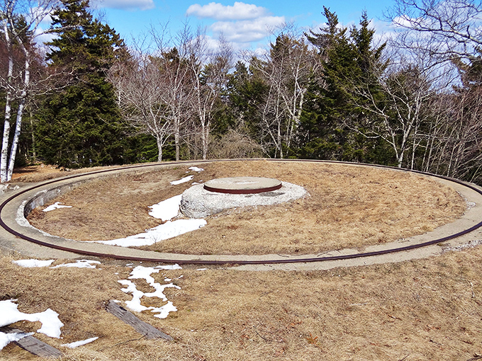 This circular gun emplacement once housed massive artillery pieces aimed seaward, now offering only spectacular views and historical echoes.
