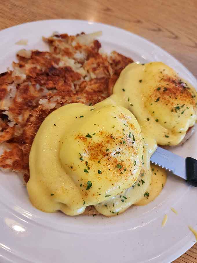 That hollandaise sauce cascading over poached eggs is basically liquid gold, making Eggs Benedict the breakfast of champions.