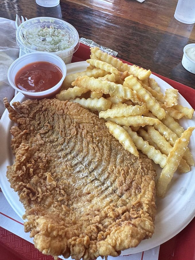 Golden-fried seafood perfection: Crispy, light batter showcasing the freshest catch, served with a side of ocean views.
