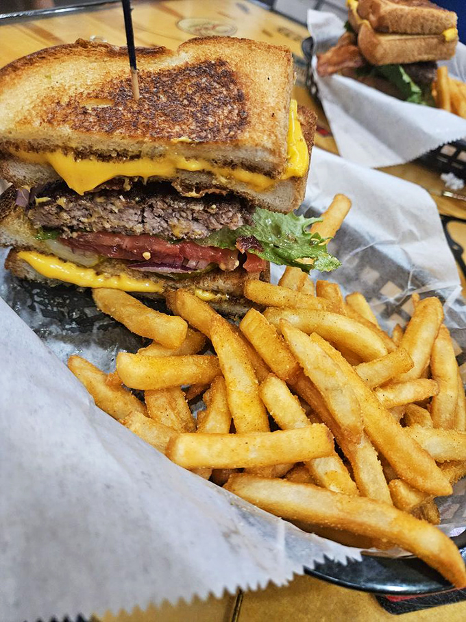 That grilled cheese burger hybrid situation is messy in the best way, requiring both hands and abandoning all dignity.