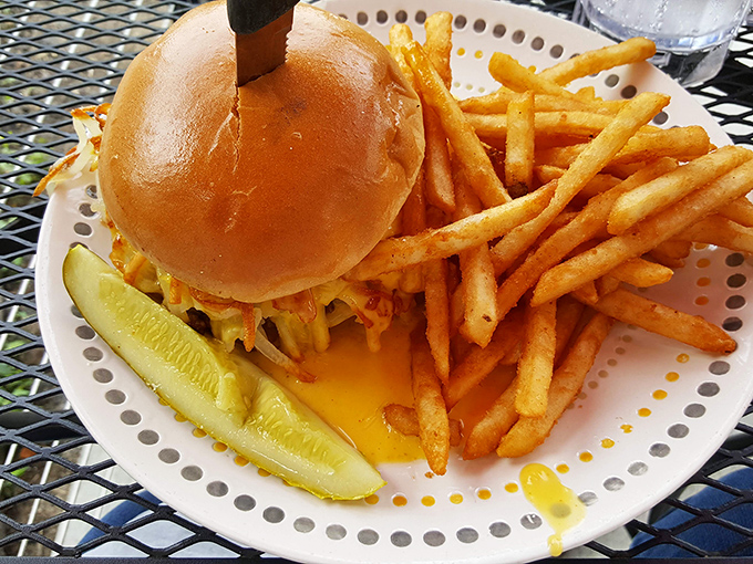 Juicy Hangover Burger with crispy fries brings comfort and smiles at Oasis Cafe in Stillwater, Minnesota, perfect anytime today friends.
