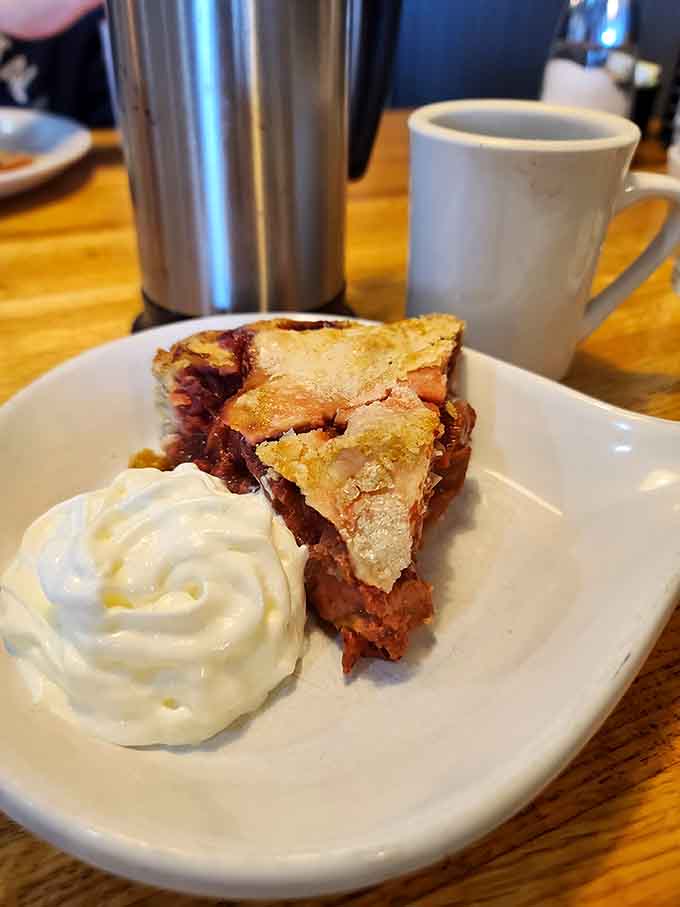 Homemade pie with whipped cream is the kind of dessert that makes you reconsider your stance on breakfast sweets.