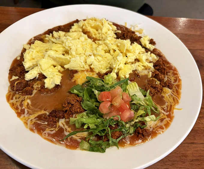 Huevos rancheros that make you question why you'd ever order anything else &ndash; a symphony of textures topped with farm-fresh eggs.