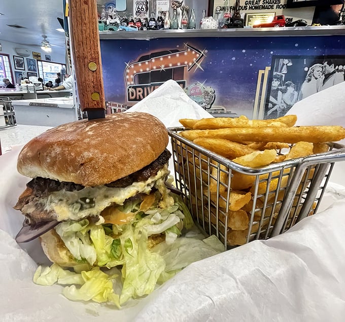This towering achievement in burger architecture combines beef, heat, and creamy cheese in a handheld masterpiece.