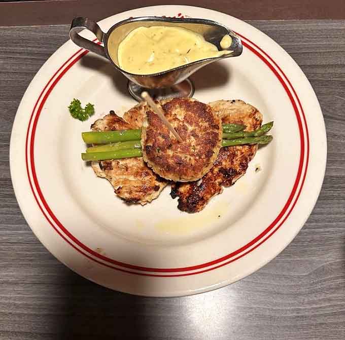 Chicken Oscar at Jensen's gets the royal treatment with asparagus and a sauce that deserves its own fan club.