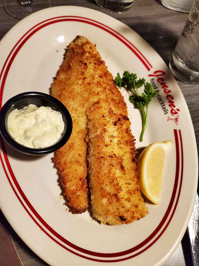 The Parmesan Walleye wears its golden crust like a crown, proving that Minnesota's favorite fish deserves royal treatment and expert preparation.