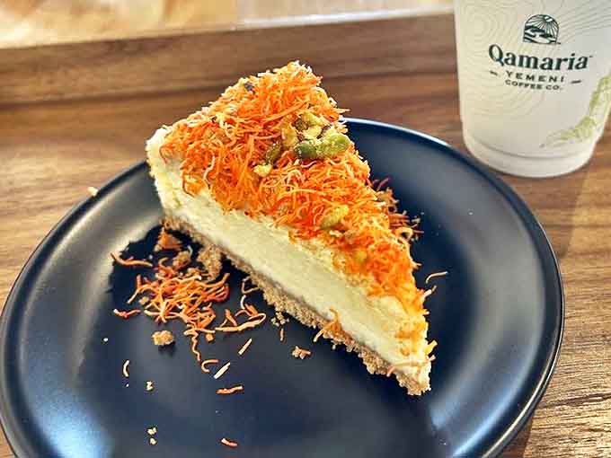 Knafeh Cheesecake with its distinctive orange topping brings centuries of Middle Eastern dessert tradition to the Midwest with show-stopping results.