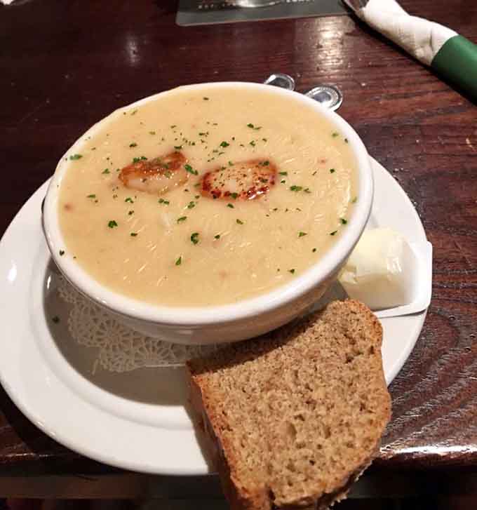 Creamy Seafood Chowder with visible chunks of seafood and fresh herbs; this is the kind of soup that warms you from the inside out.