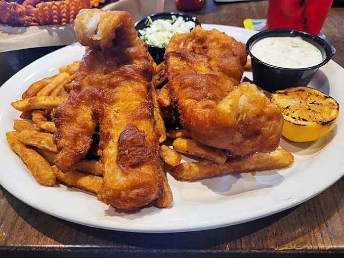 Fish and chips that would make any British pub jealous, crispy and golden perfection on a plate.