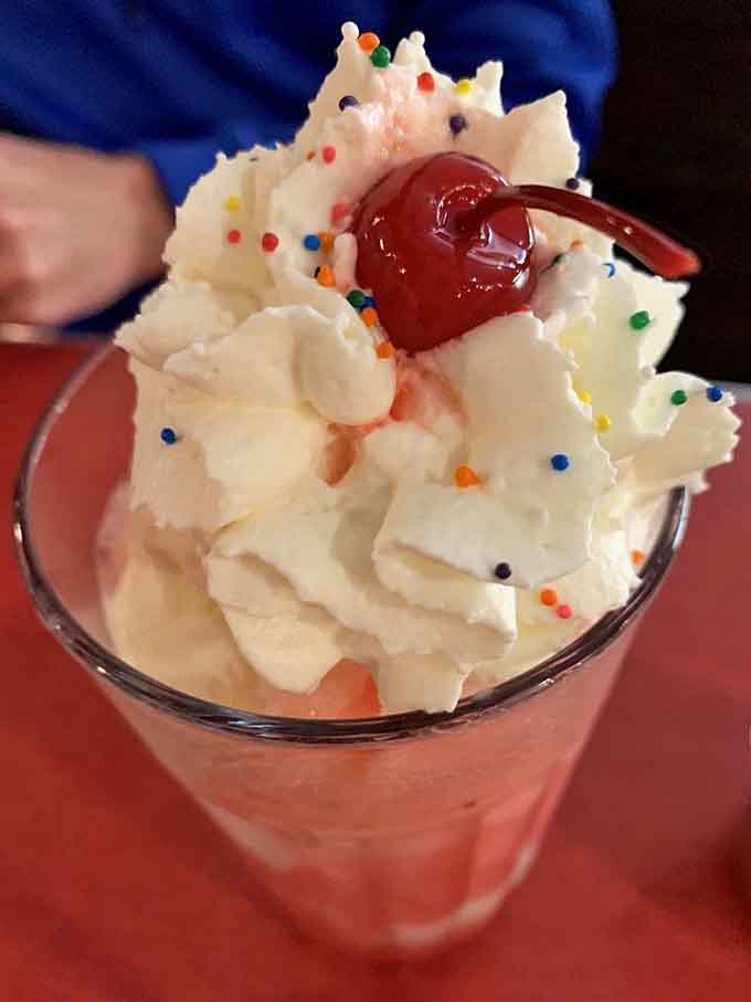 Cotton candy pink perfection in a glass, topped with whipped cream and sprinkles, because sometimes you need dessert that makes you feel like a kid again.
