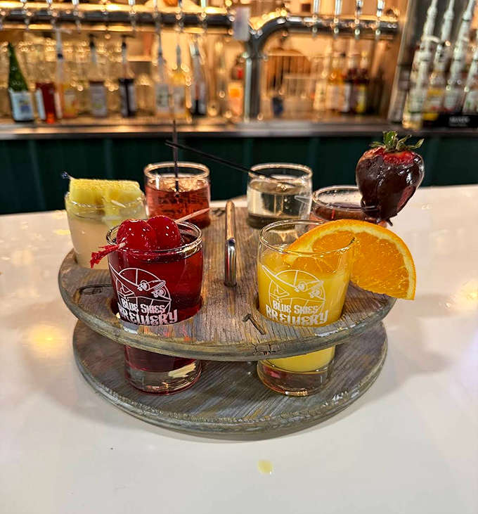 Breakfast meets happy hour with this colorful mimosa flight &ndash; each tiny glass a different celebration waiting to happen.