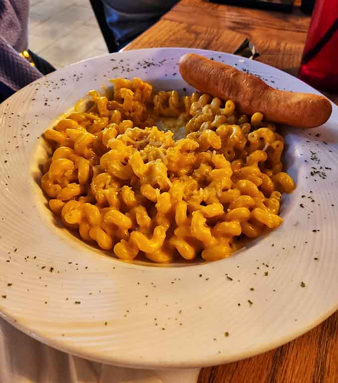 Mac and cheese with a side of sausage, proving carbs and dairy make excellent life partners.