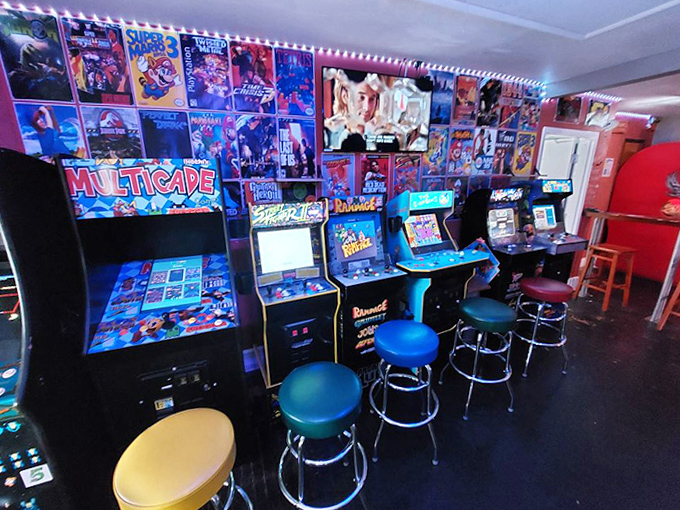 A row of arcade cabinets stands at attention, each one housing a different digital world waiting to be explored.