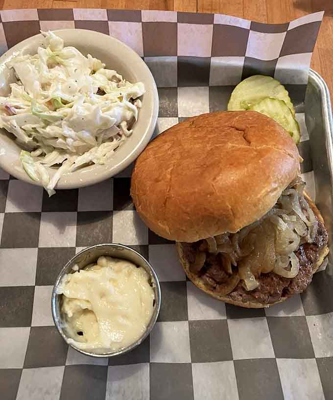 Coleslaw provides the perfect cool, crunchy contrast to the rich burger, like a refreshing palate cleanser between bites of heaven.