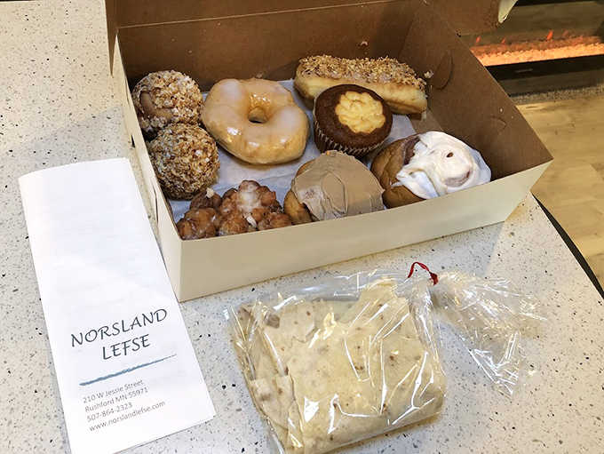 The bakery case at Norsland Lefse &ndash; where willpower goes to die and happiness comes in cardboard boxes.