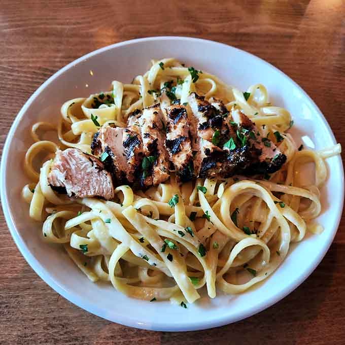 Fettuccine Alfredo topped with grilled chicken, because sometimes the classics are classic for very good reasons indeed.