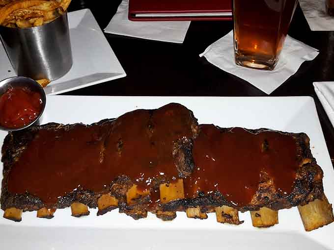 Those ribs are glazed to perfection, the kind of sticky, fall-off-the-bone goodness that requires extra napkins and zero shame.