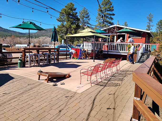 The Old County Inn's outdoor deck invites lingering conversations under string lights as the mountain air turns pleasantly crisp.