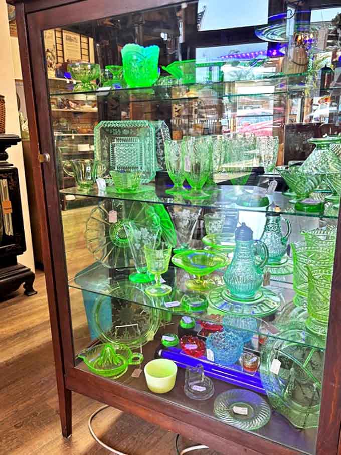 The eerie green glow of uranium glass creates a sci-fi museum effect &ndash; beautiful, slightly radioactive, and utterly captivating under special lighting.