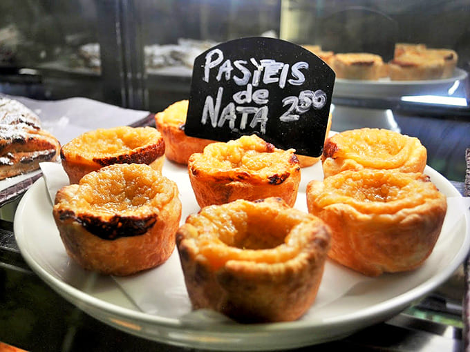 These Portuguese custard tarts with their caramelized tops are like cr&egrave;me br&ucirc;l&eacute;e's exotic cousin who studied abroad and came back impossibly sophisticated.