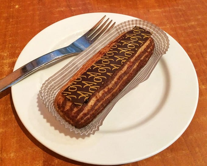The &eacute;clair: France's gift to anyone who believes that choux pastry, cream, and chocolate glaze constitute the holy trinity of desserts.