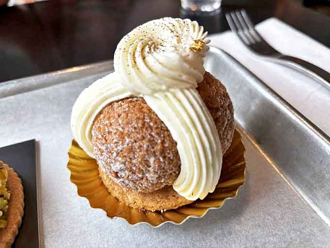 The St. Honor&eacute; combines textures in magnificent harmony: crisp pastry base, caramelized cream puffs, and clouds of perfectly piped cream.