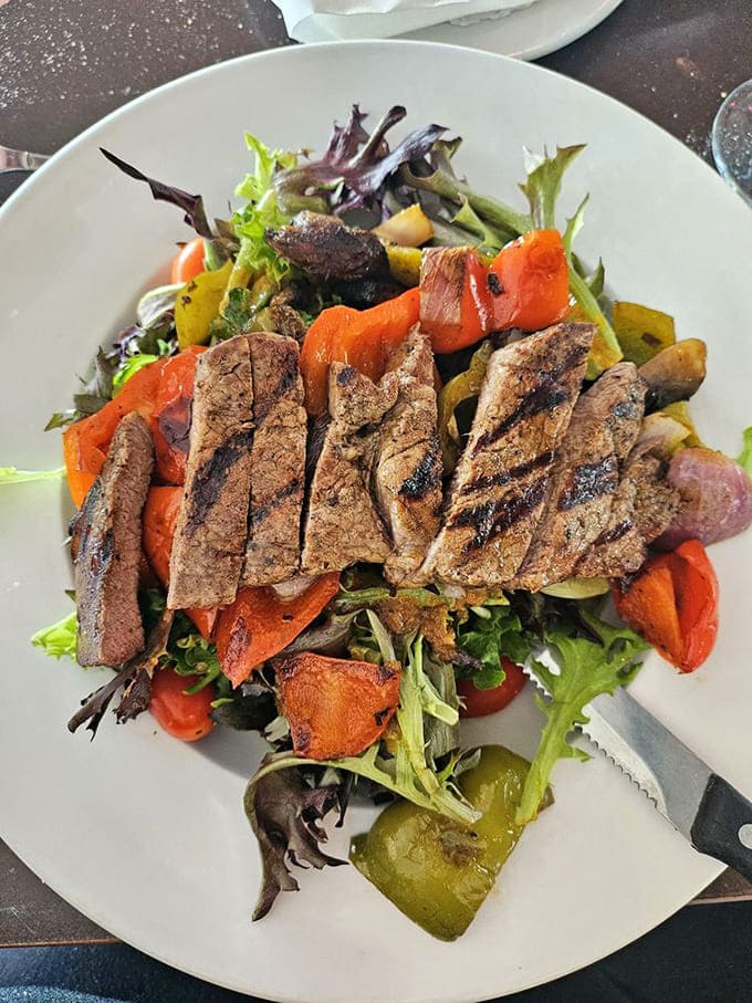 Steak salad that's basically a full meal pretending to be health food, and we're not complaining one bit about it.