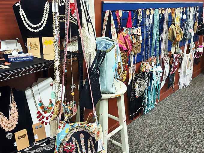 Vintage handbags and scarves create a rainbow of textures and patterns, each accessory telling its own fashion story.