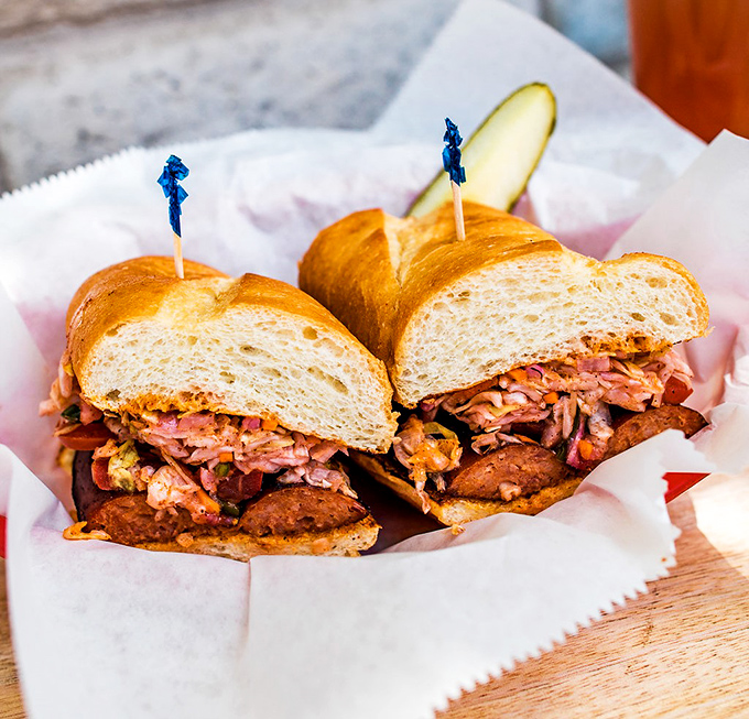 This pulled pork sandwich isn't just a meal &ndash; it's a structural engineering marvel holding more flavor than seems physically possible.
