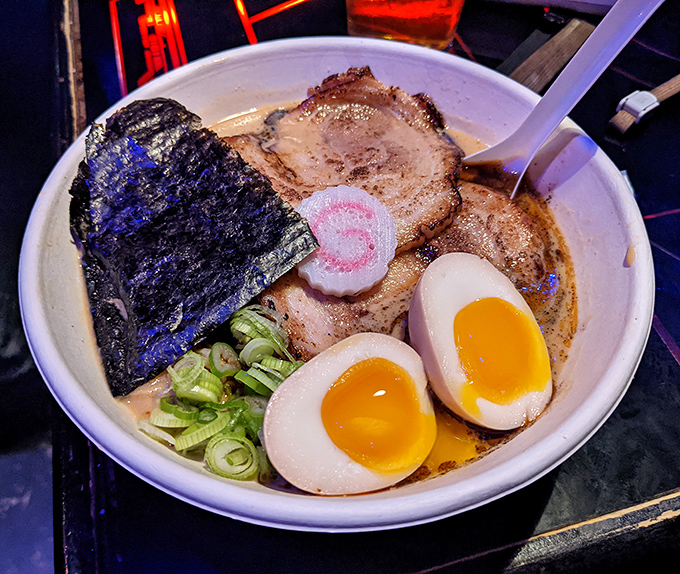 This steaming bowl of ramen with perfectly jammy eggs might make you pause your game &ndash; the ultimate comfort food for digital warriors.
