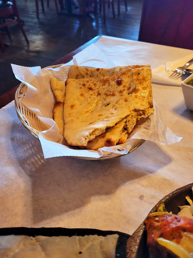 Freshly baked naan &ndash; the ideal edible utensil that somehow manages to be both pillowy and crisp in all the right places.