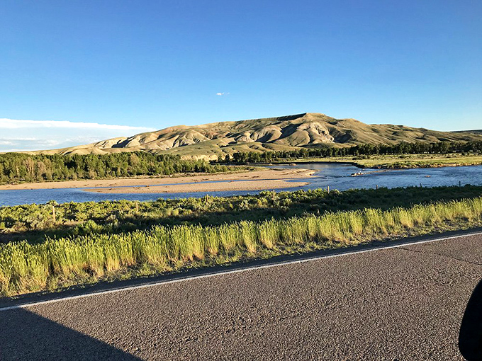 Mother Nature shows off her watercolor skills where river meets valley, creating a refreshing contrast to the arid landscapes elsewhere on 191.