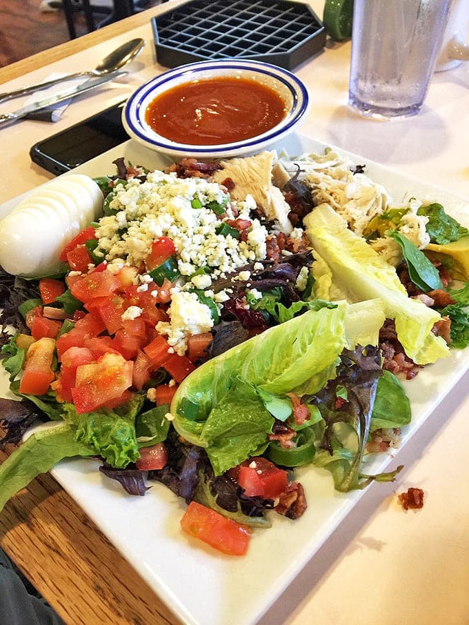 Even the salads here refuse to be boring, arriving as colorful compositions that prove healthy eating doesn't require suffering through bland rabbit food.