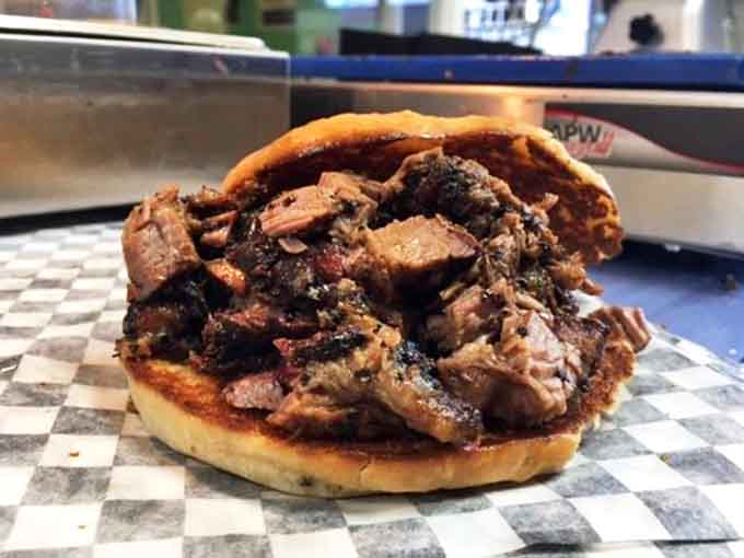 Smoked to perfection and stacked generously, this brisket sandwich doesn't believe in the concept of portion control, and we're grateful for that.