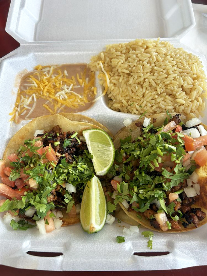 Simple math: quality beef + proper seasoning + traditional garnishes = tacos that haunt your dreams long after the last bite.