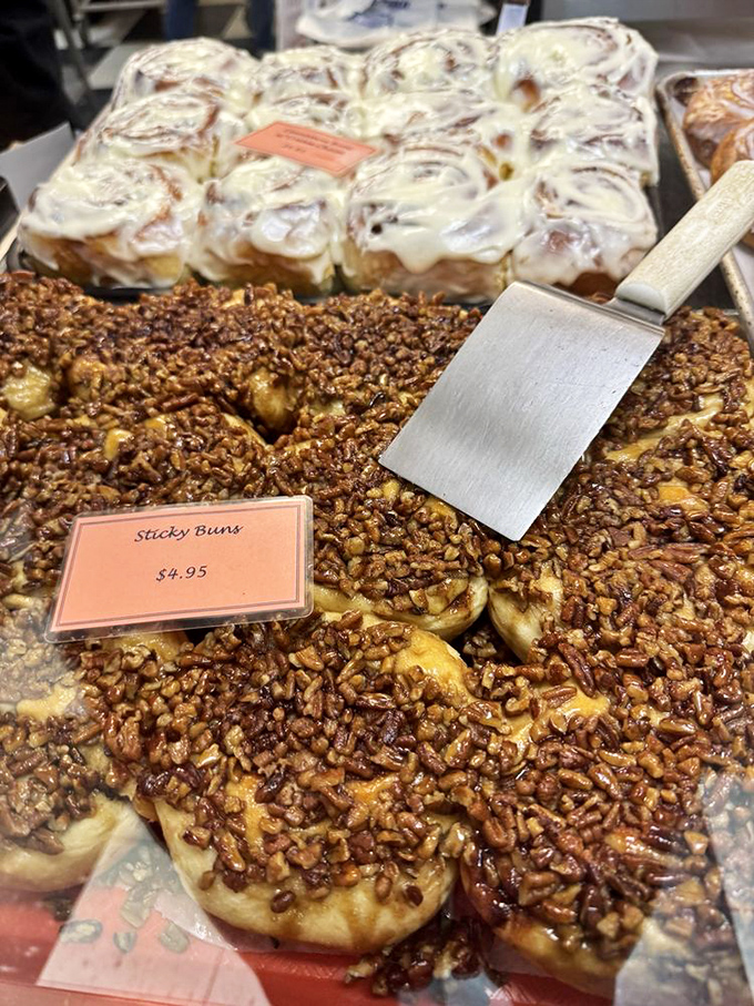 These aren't just cinnamon rolls, they're spiral-bound love letters to your mouth, with a pecan P.S. that seals the deal.