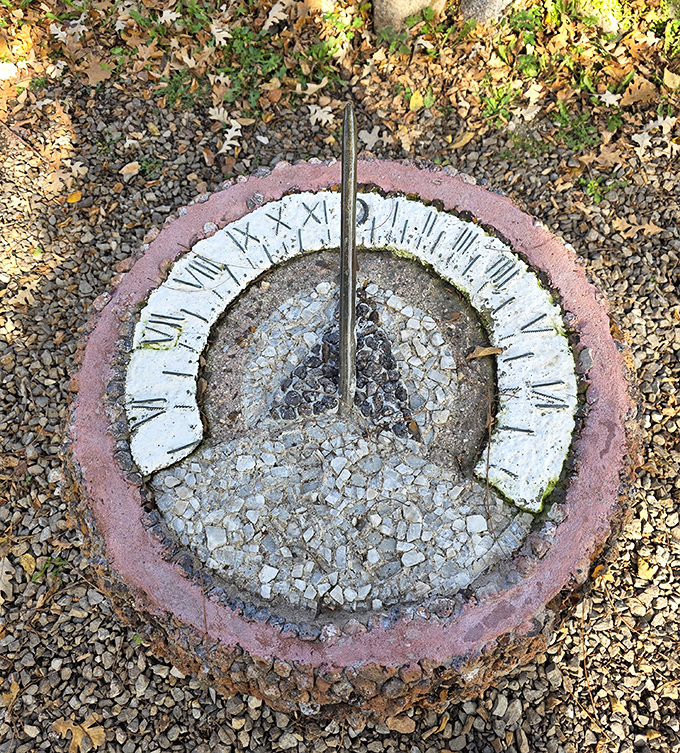 The sundial proves that telling time can be both functional and beautiful when you're willing to arrange colored stones in circles instead of just checking your phone like everyone else.