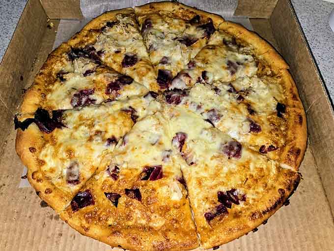 When a Reuben sandwich meets a pizza, magic happens, and this beautiful creation is the delicious proof.
