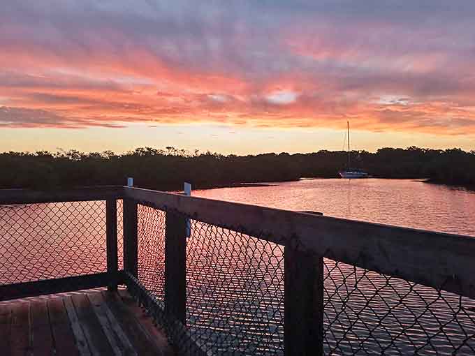Sunset transforms Clam Bayou into a watercolor masterpiece, where sky meets water in a display that makes even smartphone cameras seem inadequate.