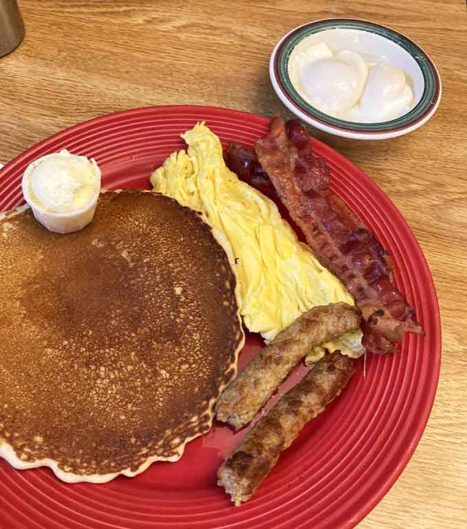 Eggs, bacon, and hash browns arranged like edible art&mdash;breakfast never looked so good or tasted so right.