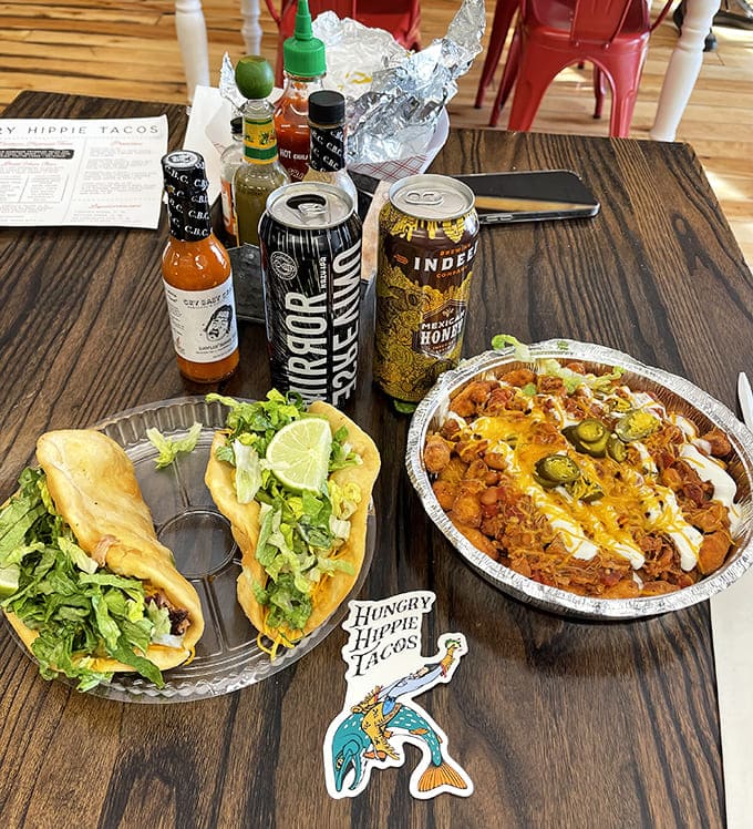 The holy trinity of happiness &ndash; two tacos, loaded nachos, and craft beer create a tabletop fiesta that's worth crossing state lines for.