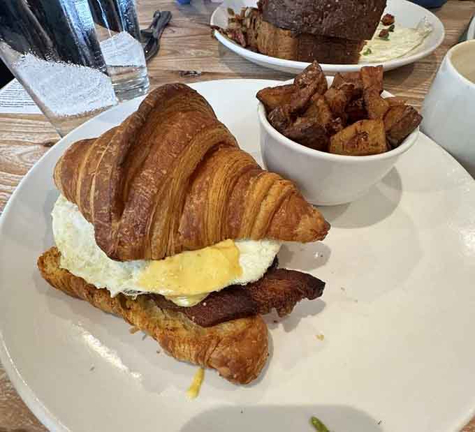 Bacon, egg, and croissant walk into a caf&eacute;, and everyone lives happily ever after.