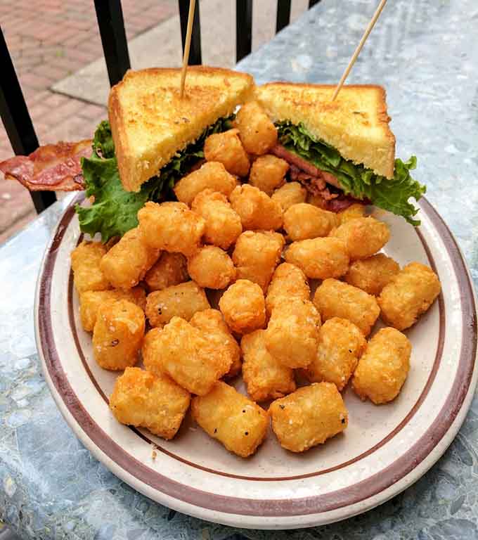 Tater tots so good they'd make Napoleon Dynamite weep with joy, golden and crispy like little nuggets of pure happiness.