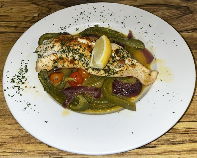 Fresh grilled fish with colorful vegetables offers a lighter option that doesn't sacrifice an ounce of flavor.